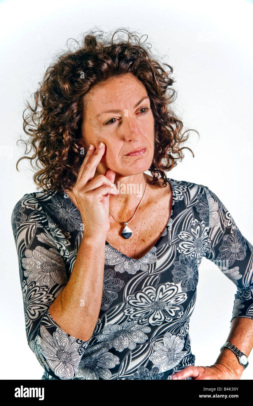 Gesture touch cheek mood thinking hi-res stock photography and images ...