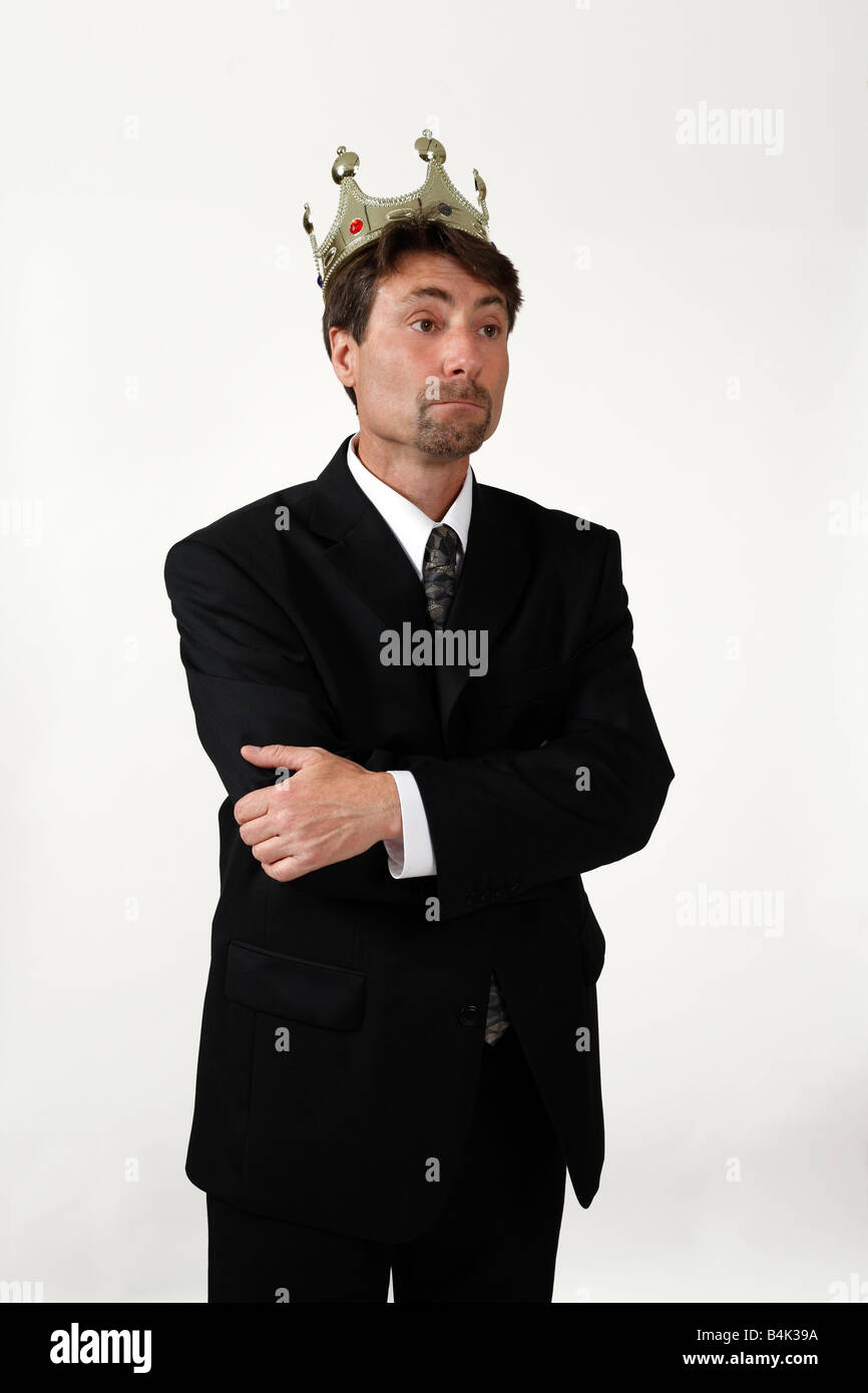 Male businessman 45 years old with crown on head Stock Photo - Alamy