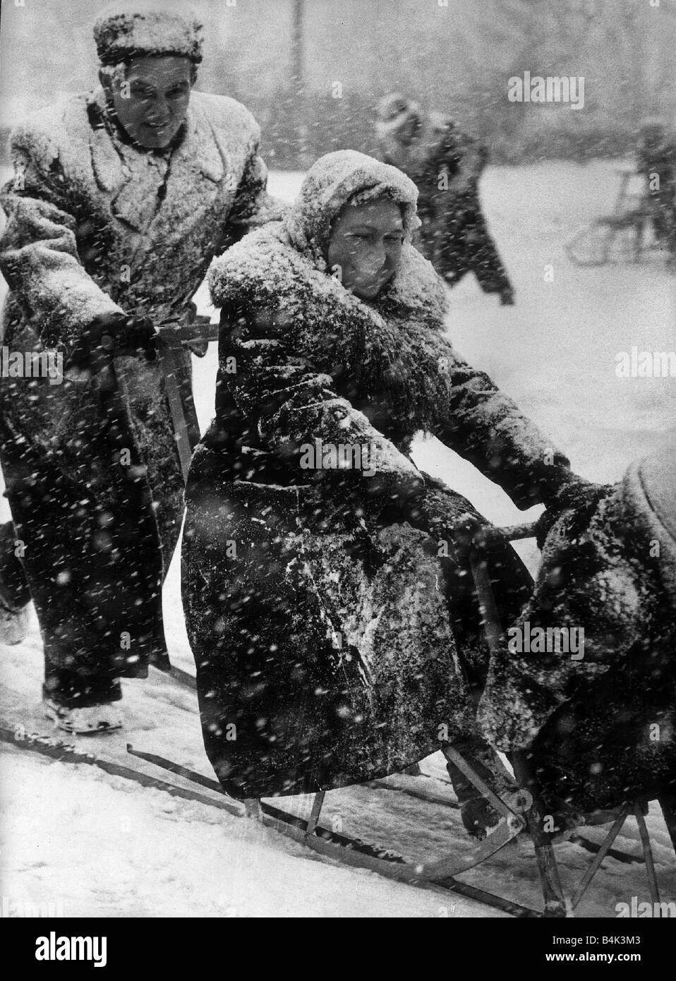 Fun in snow on Black and White Stock Photos & Images - Alamy