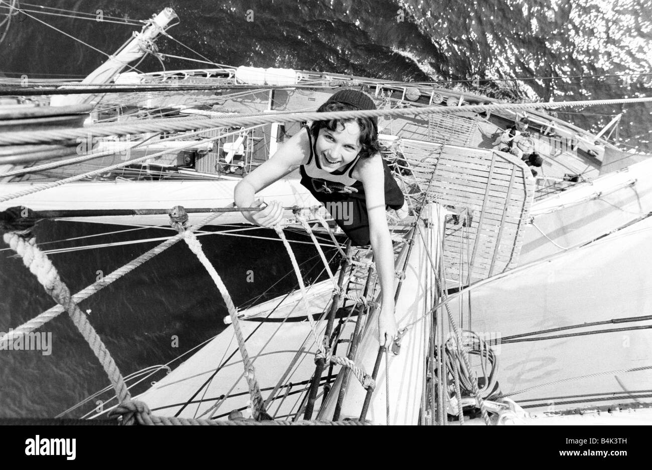15 year old Belinda Pickard climbs the foremast rigging as the sail ...