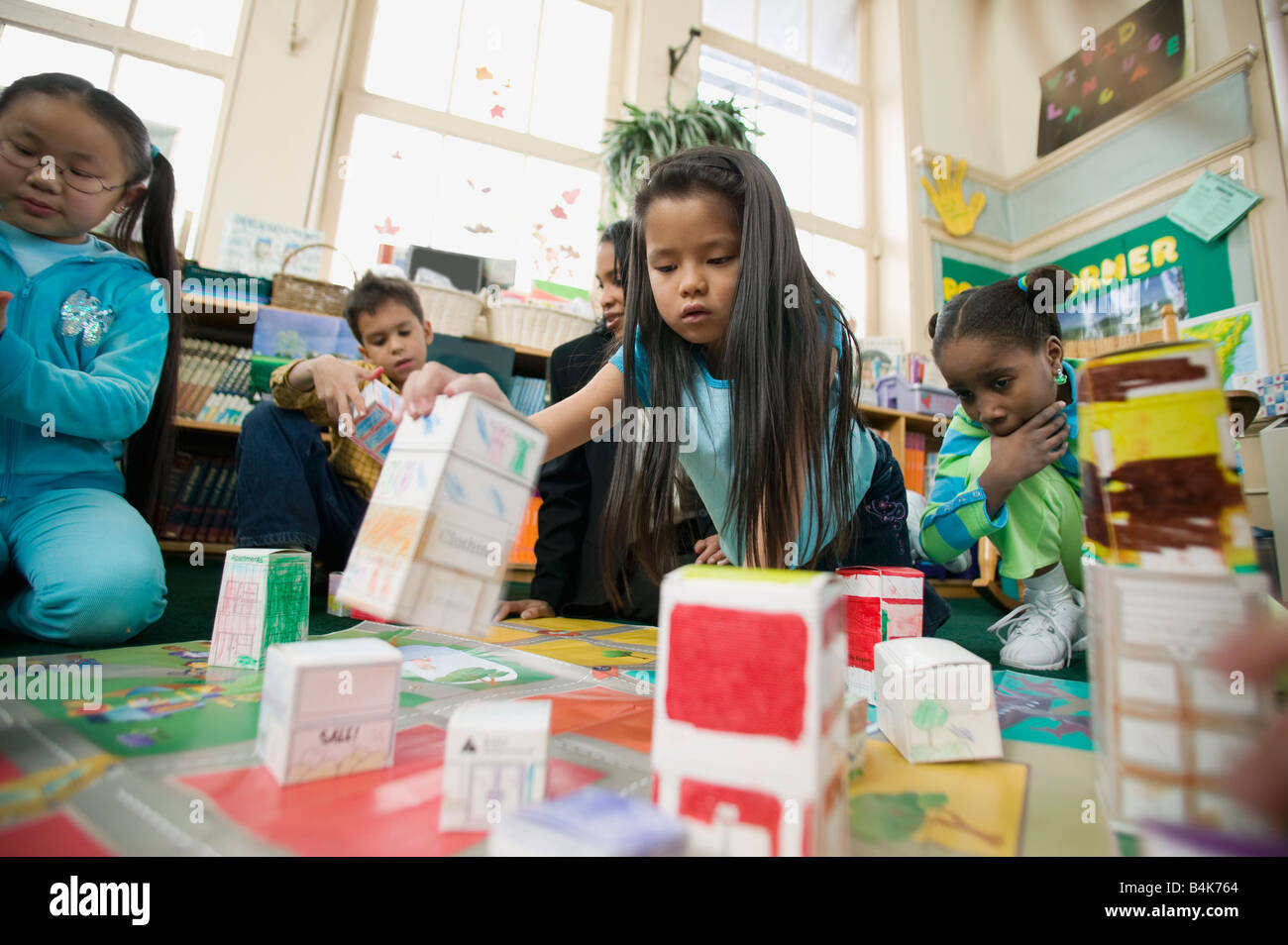 Multi-ethnic students in classroom Stock Photo - Alamy