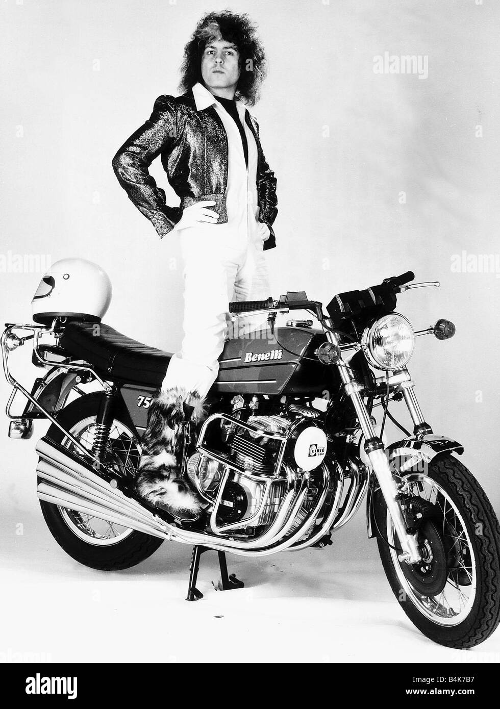 Marc Bolan Singer standing on motor bike Dbase MSI Stock Photo - Alamy