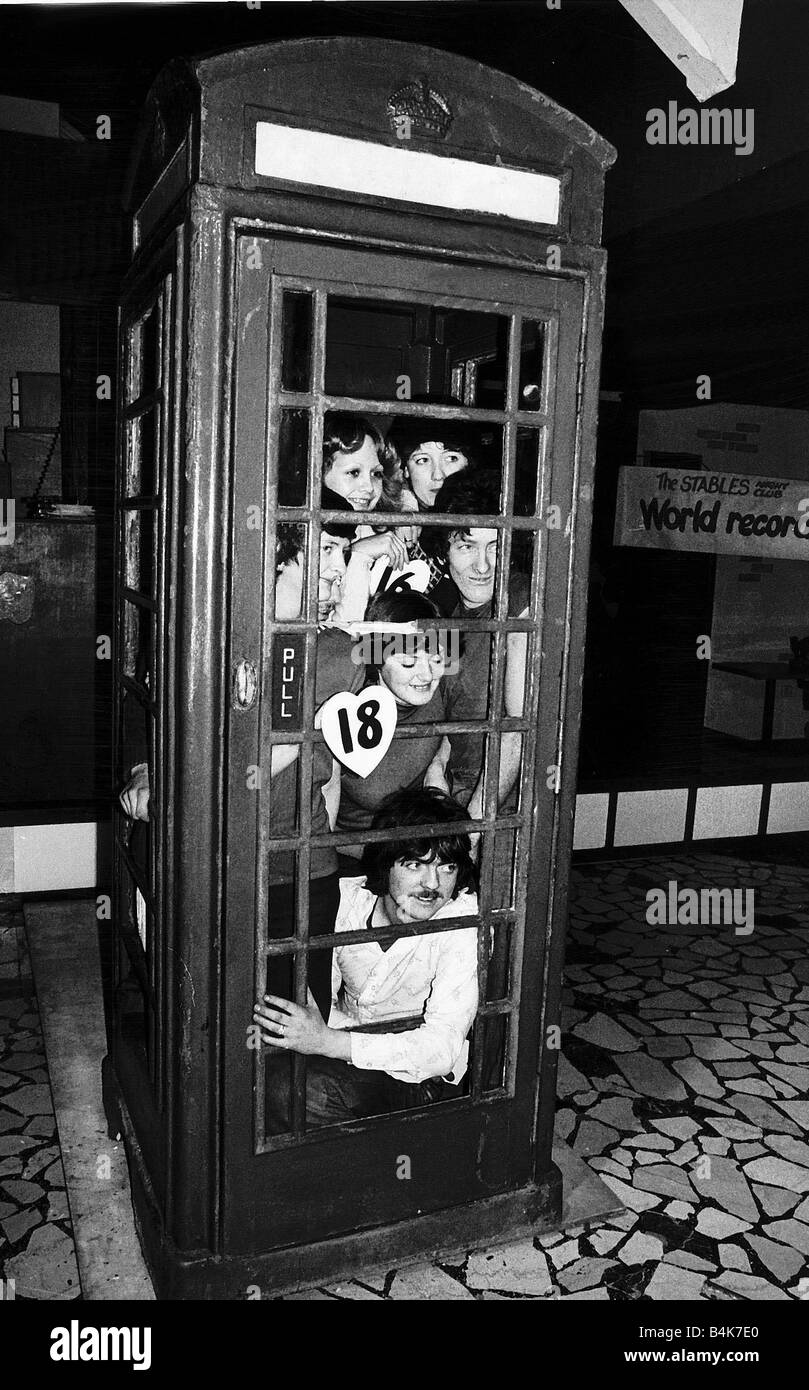 Twenty people set a record for squeezing into a telephone box Stock ...