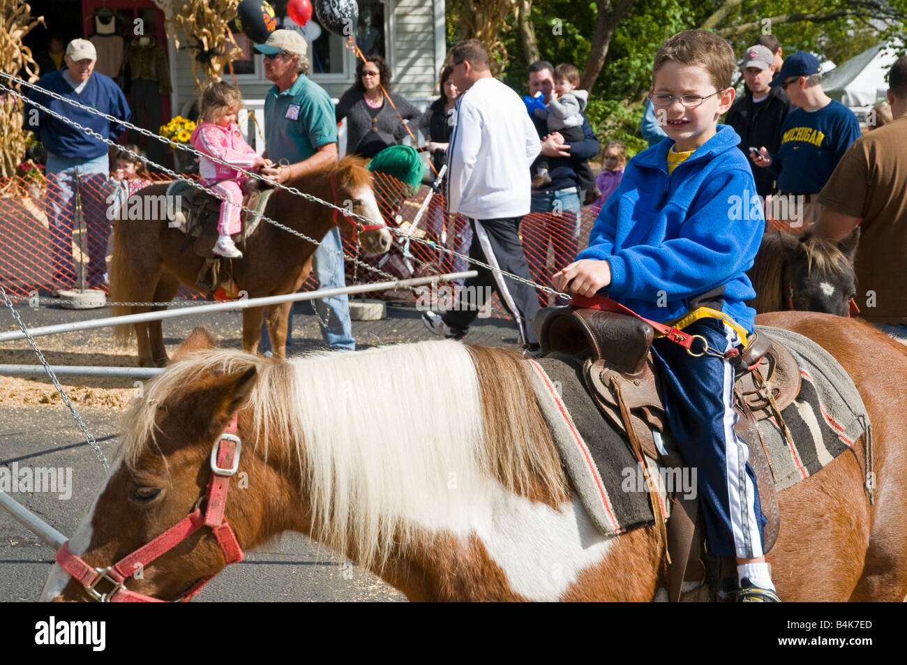 Kids Pony Ride At Festival Stock Photo Alamy kids-pony-ride-at-festival-stock-photo-alamy