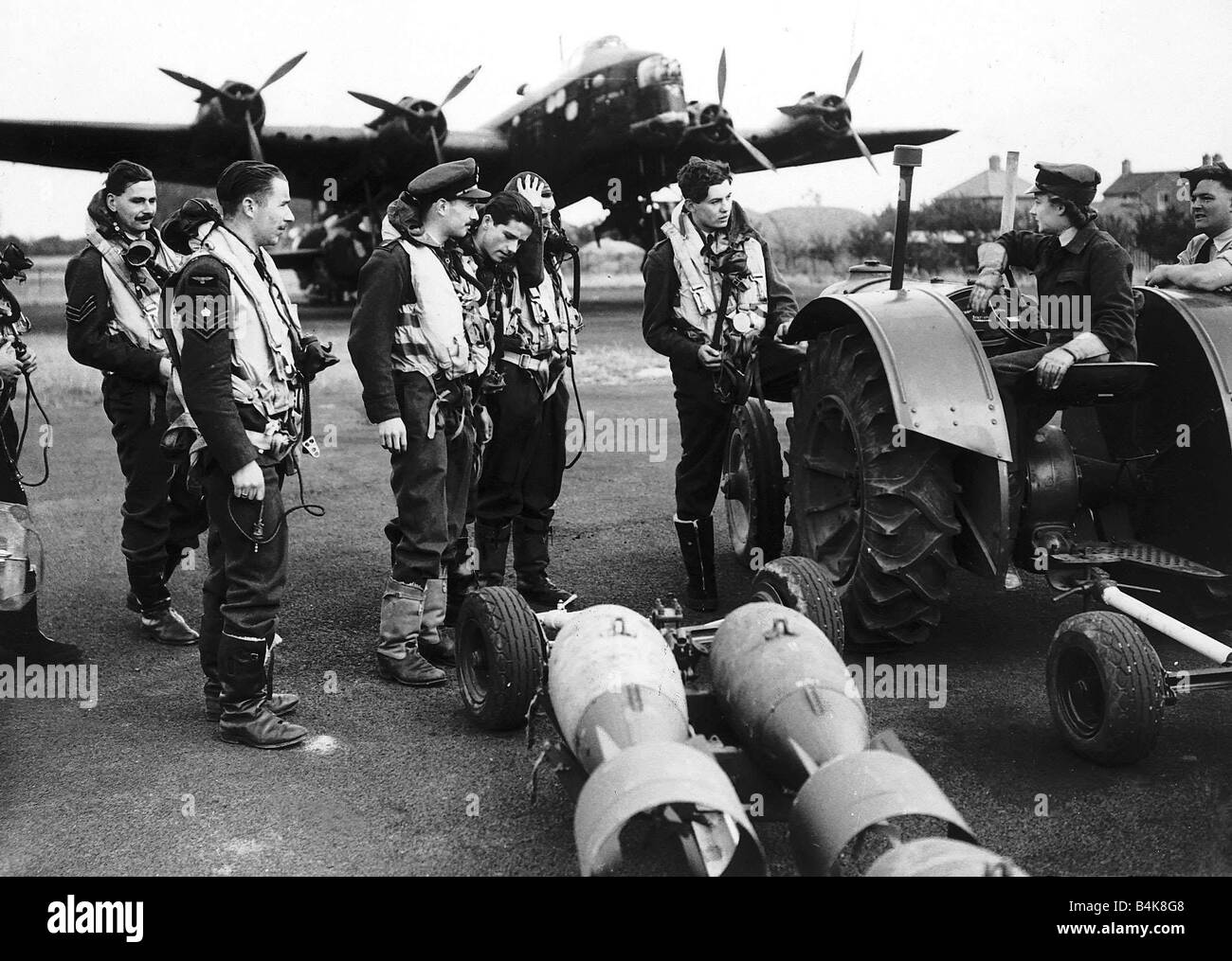WW2 WAAF Auxiliary Air Force driver discusses the arming of a bomber ...
