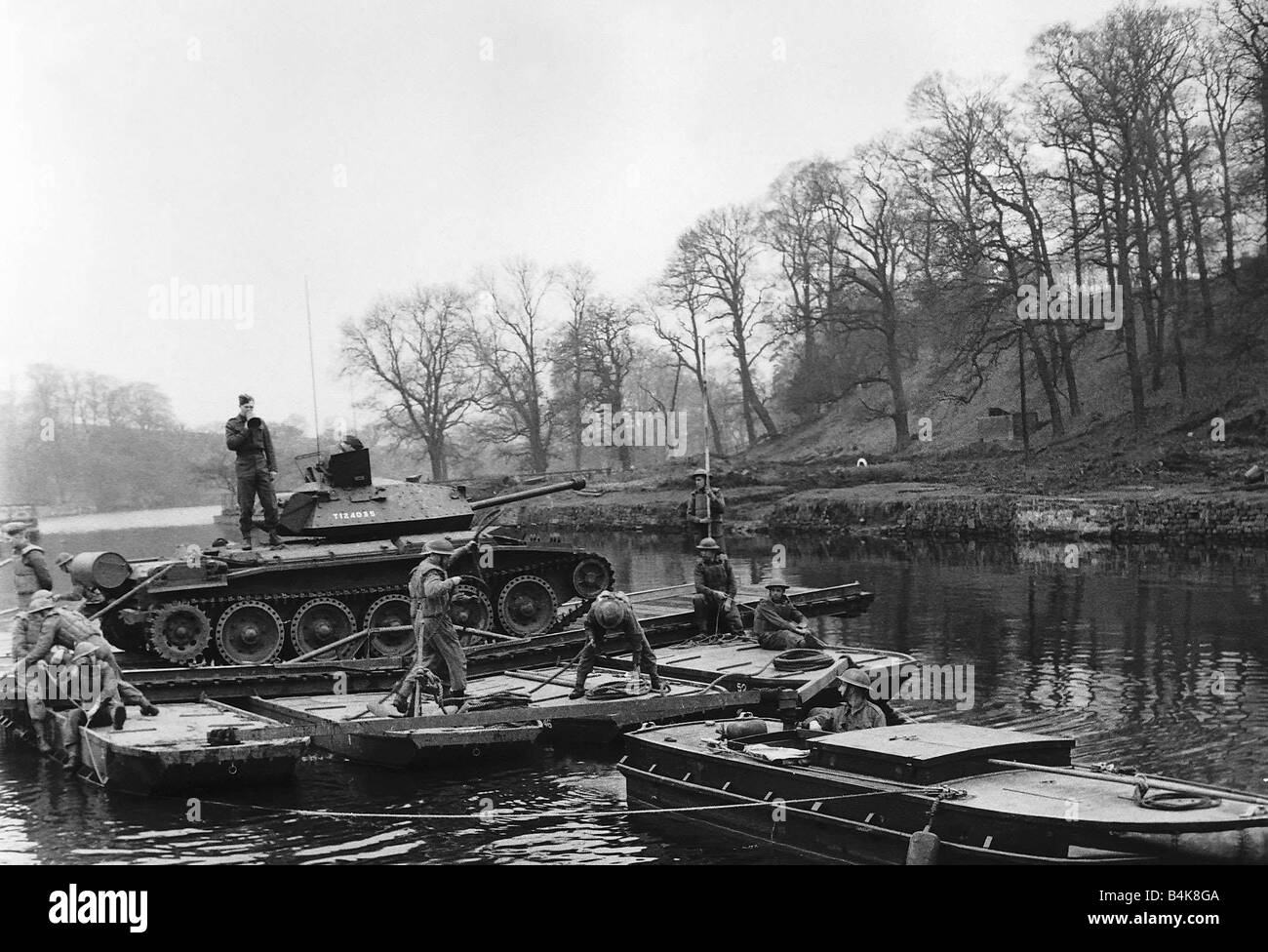 Crusader tank being ferried across river during demonstration of wet ...
