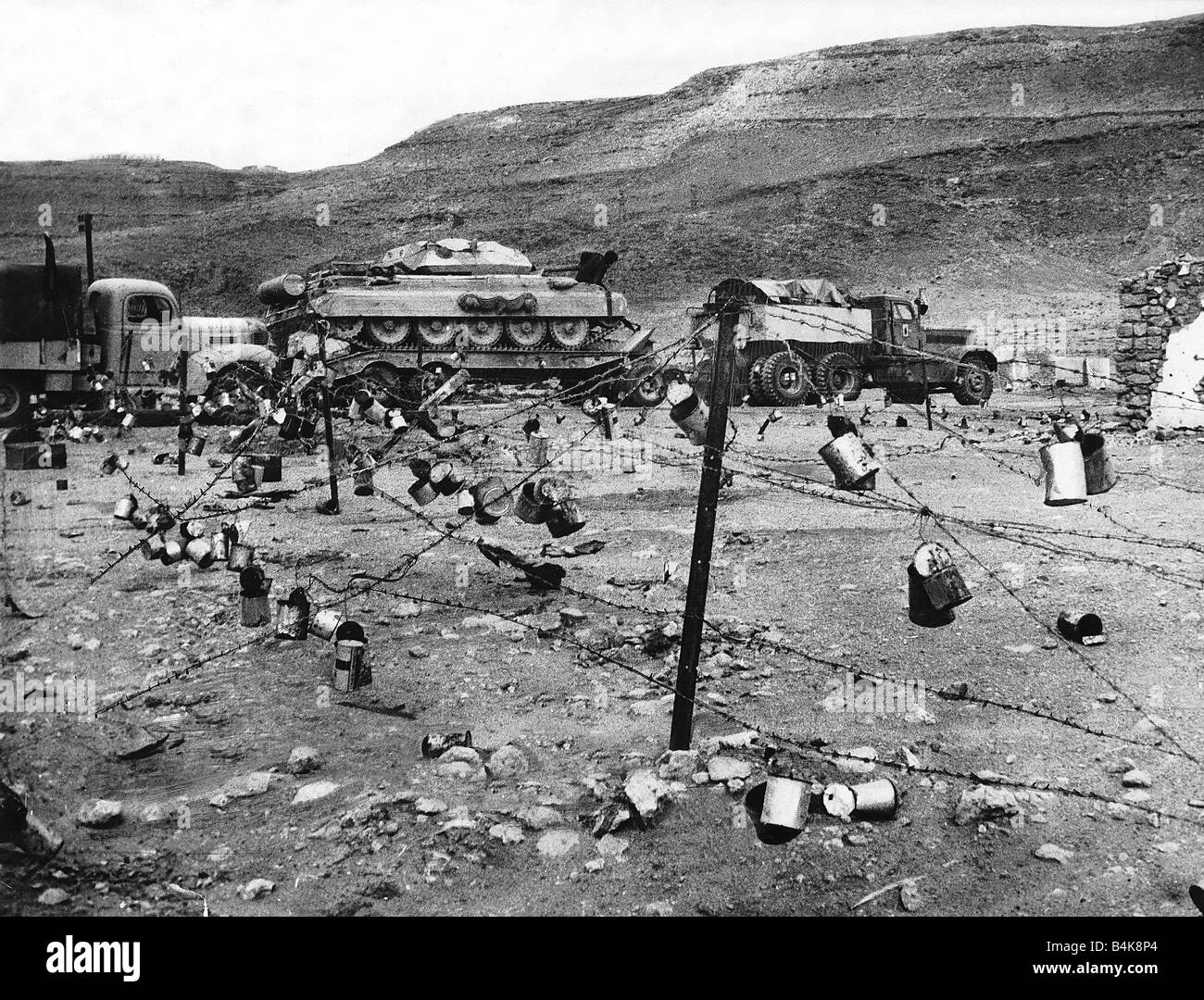 WW2 British tank transporter passes through an Italian wire defence in ...