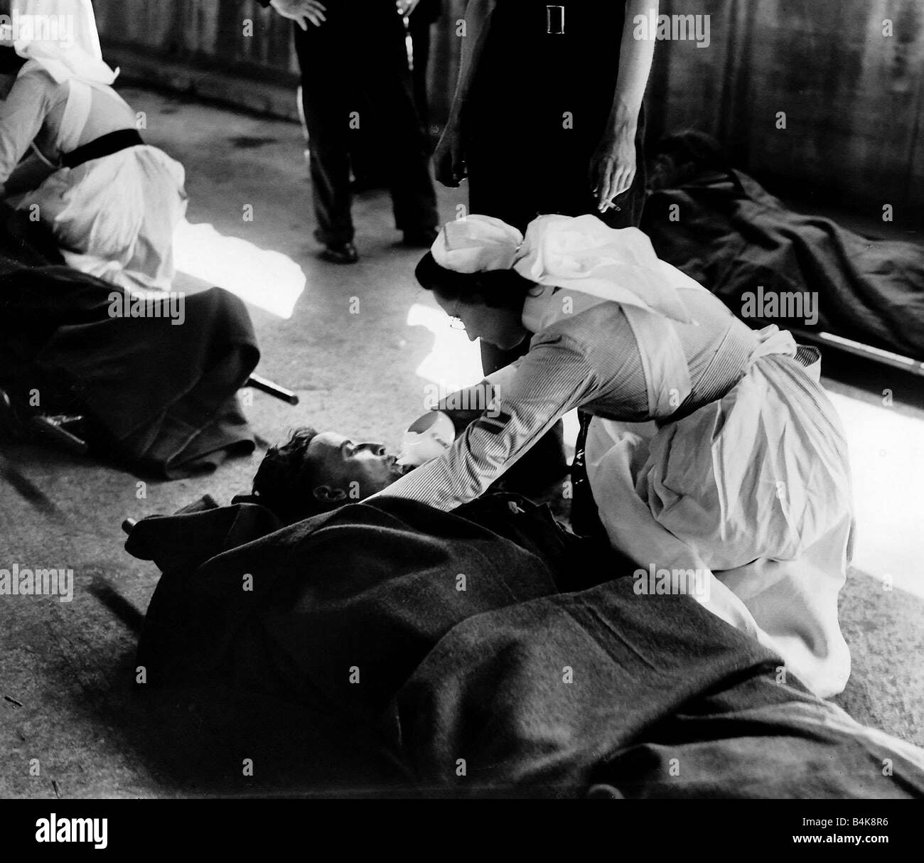 Wounded British soldier evacuated from Europe 1940 arrives at a London ...