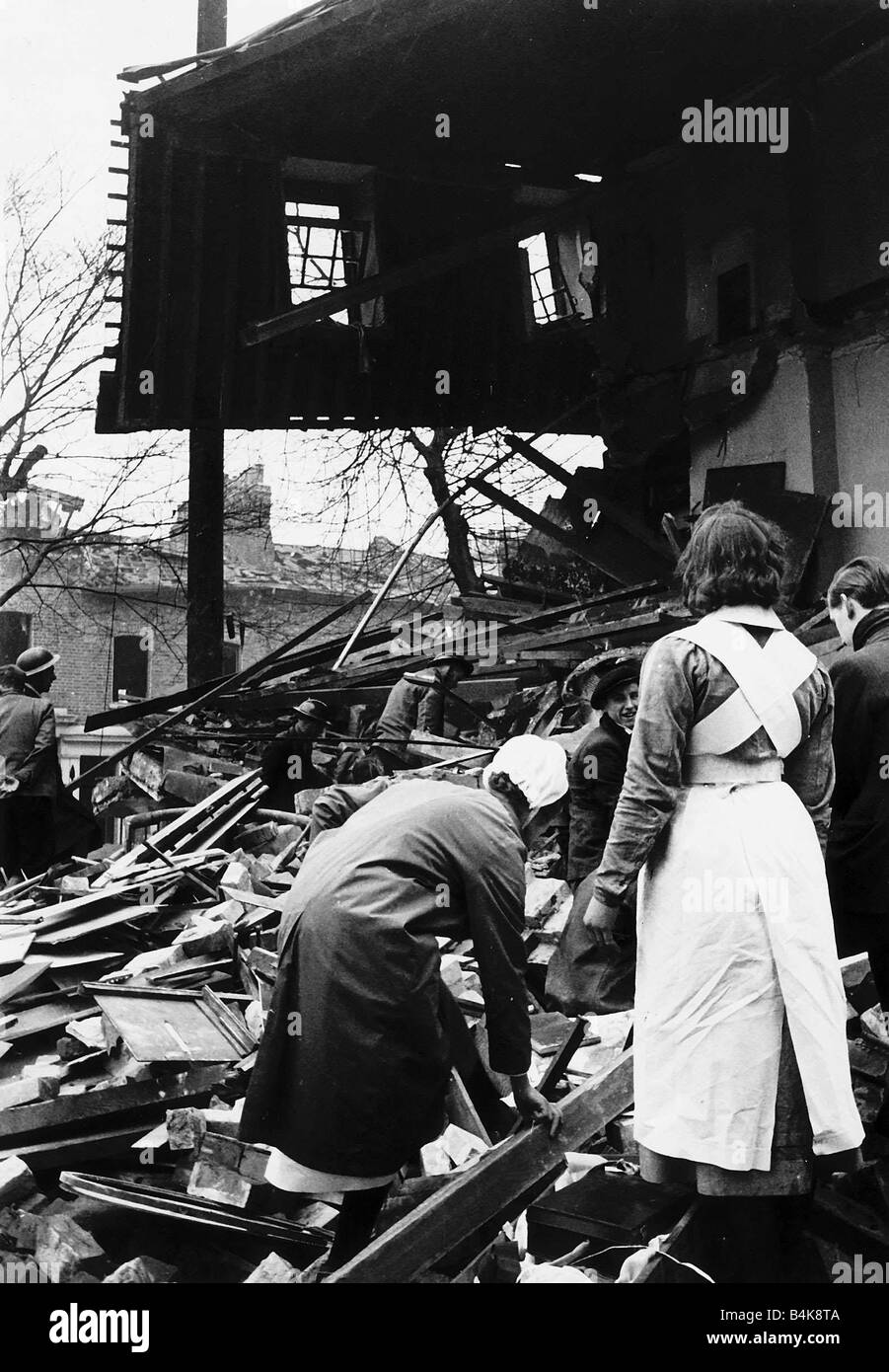 WW2 Bombed Hospital nurses and air raid wardens search wreckage Stock ...