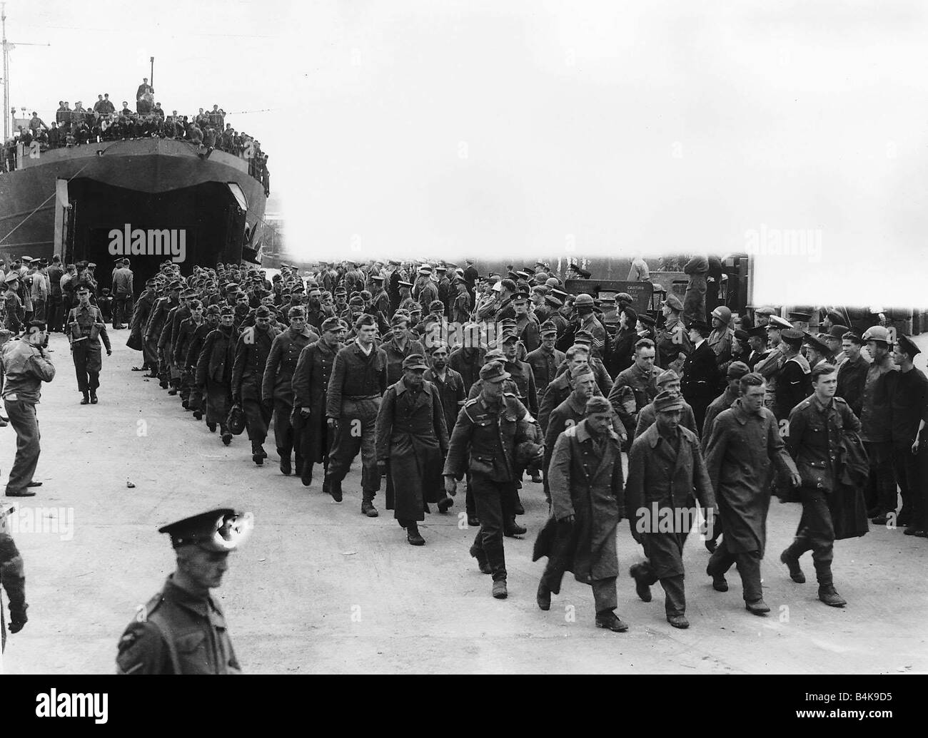 WW2 Prisoners marching off ship July 44 Stock Photo - Alamy