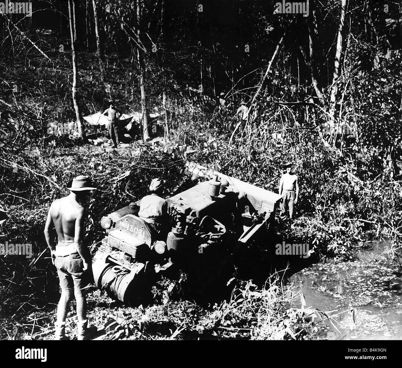 WW2 Sikh members of the Indian Engineers clear stream bed near Pinwe in ...