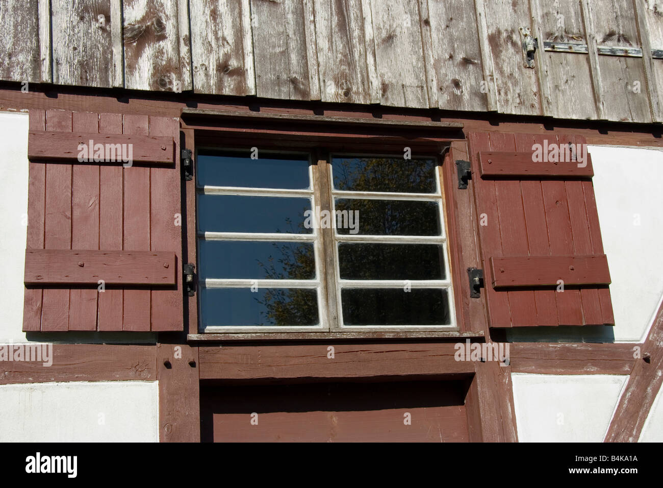 Window of an ancient timbered house with wooden lattice blinds and the ...