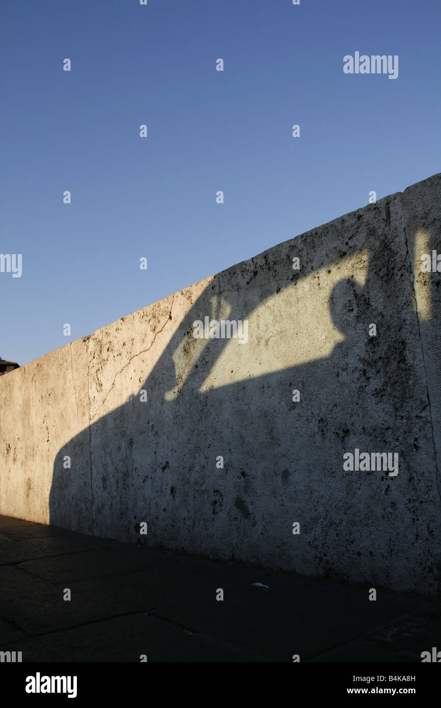 one car shadow on wall in city with blue sky Stock Photo - Alamy