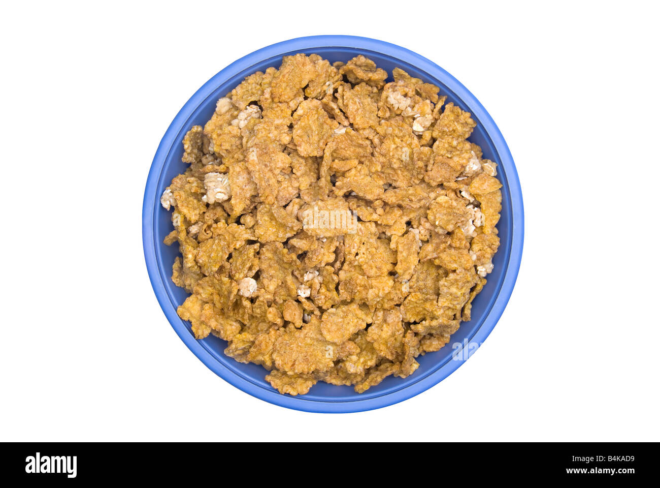 A bowl of dry wheat flake cereal isolated on white Stock Photo - Alamy
