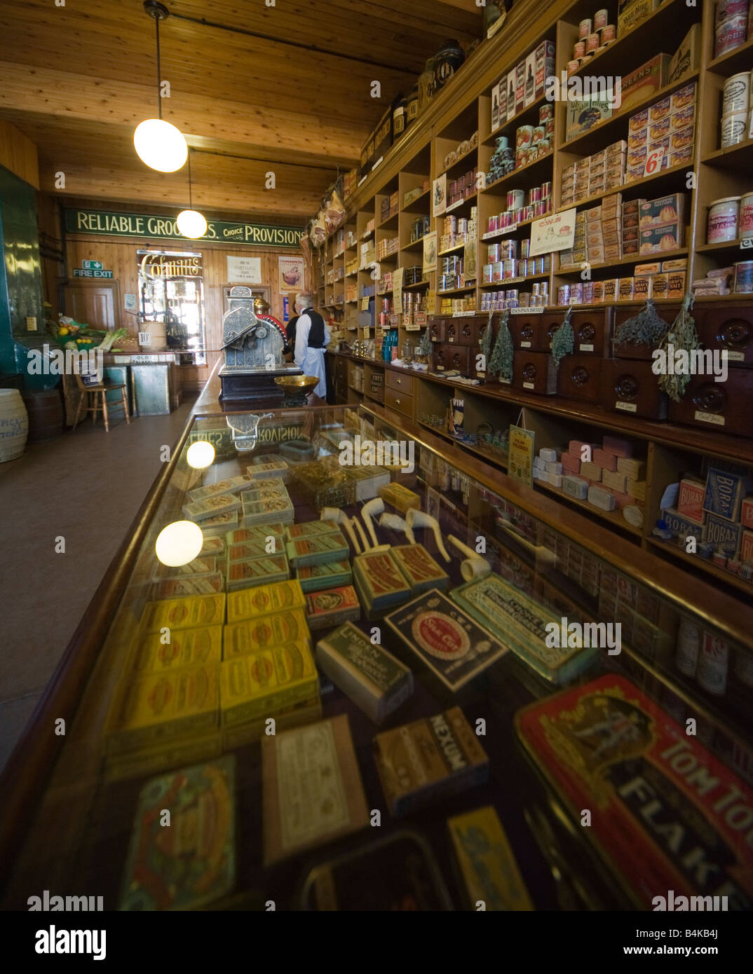 Shelves of goods in a victorian shop at the turn of the 19th century ...