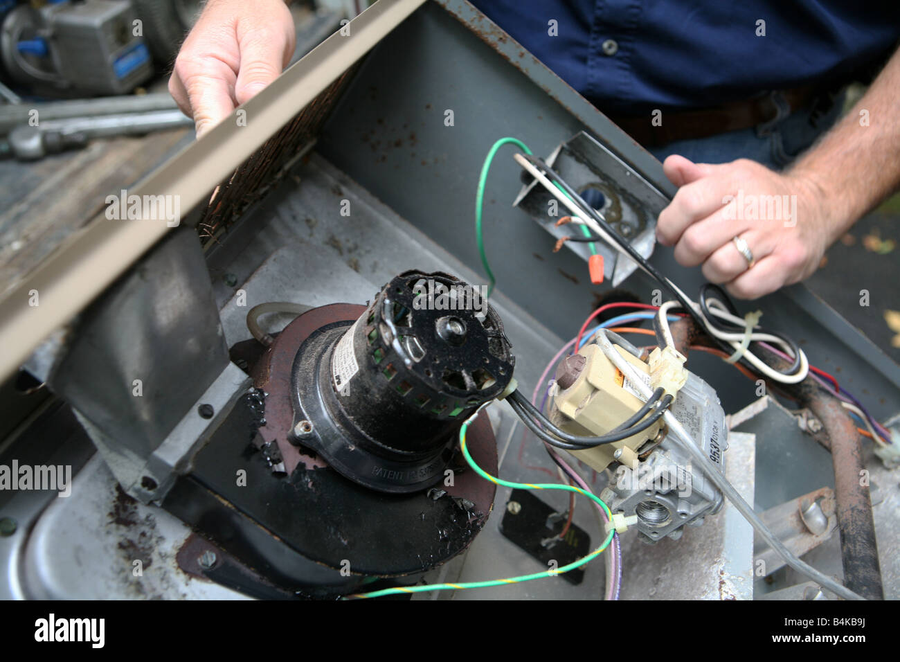Installation of new high-efficiency gas furnace Stock Photo - Alamy
