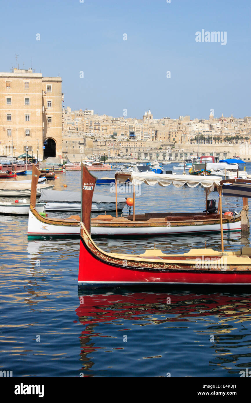 Luzzu boats at "Dockyard Creek", Senglea, Malta Stock Photo - Alamy