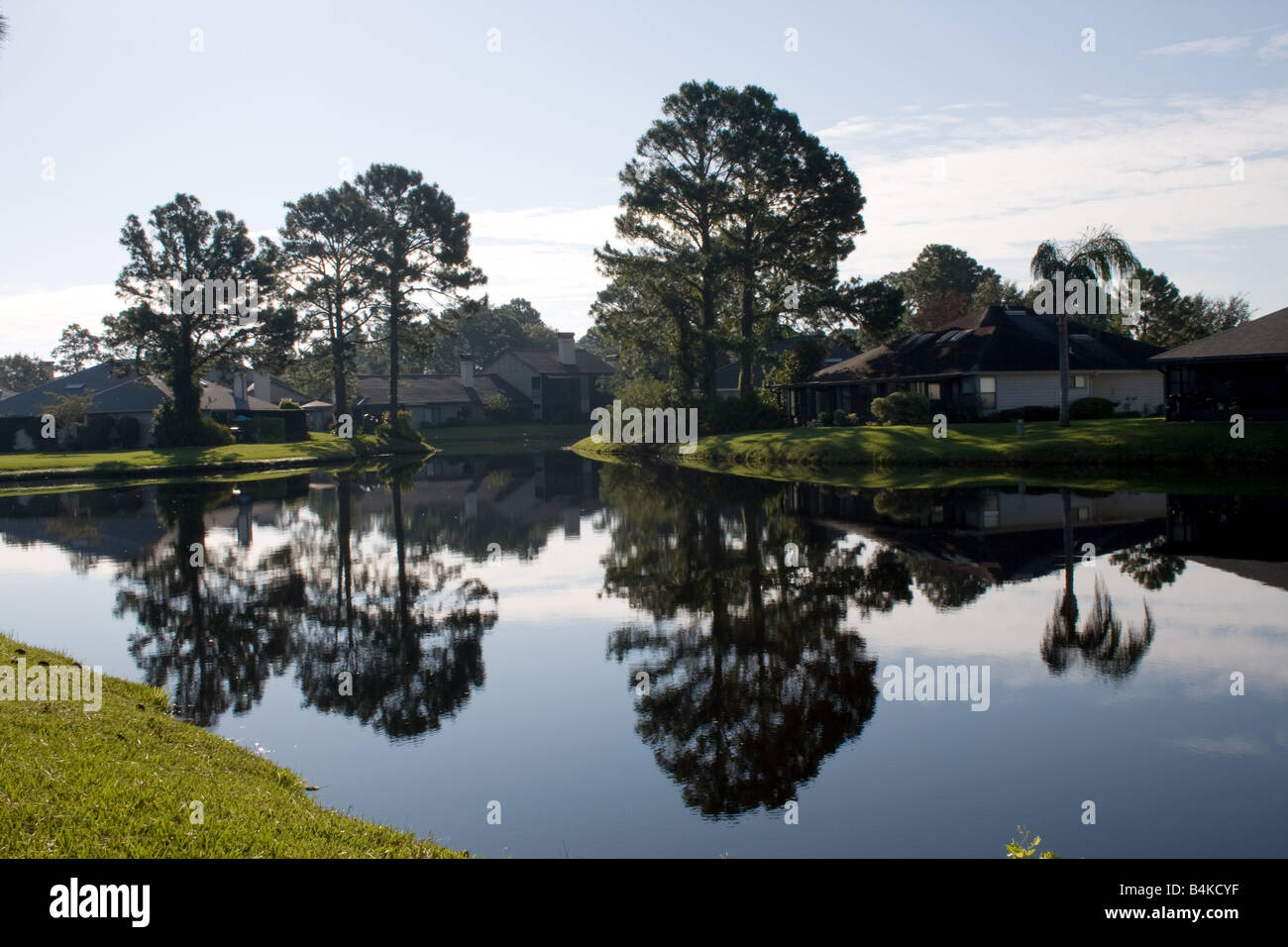 Trees reflecting in still water hi-res stock photography and images - Alamy