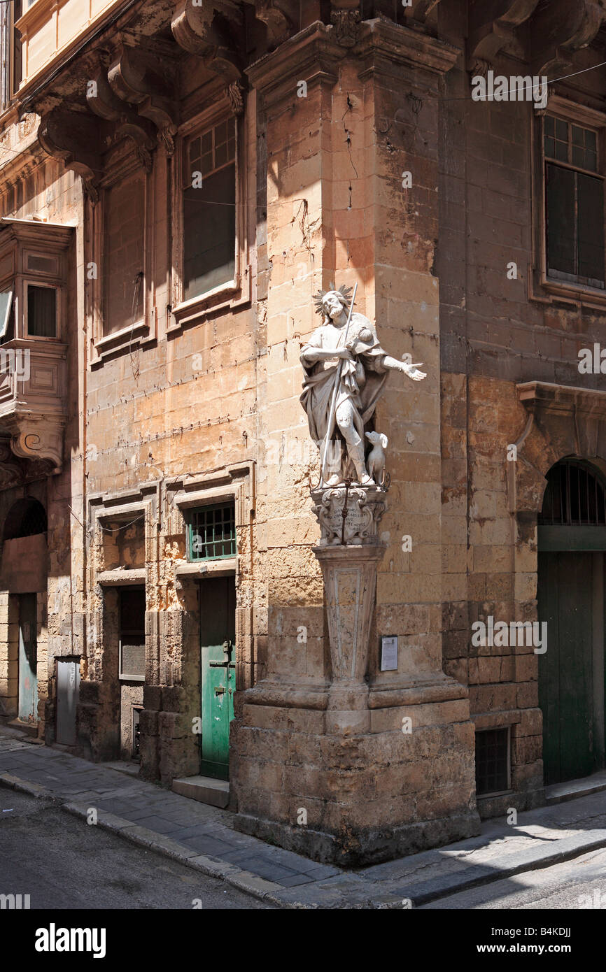 Holy statue on street corner, Valletta, Malta Stock Photo - Alamy