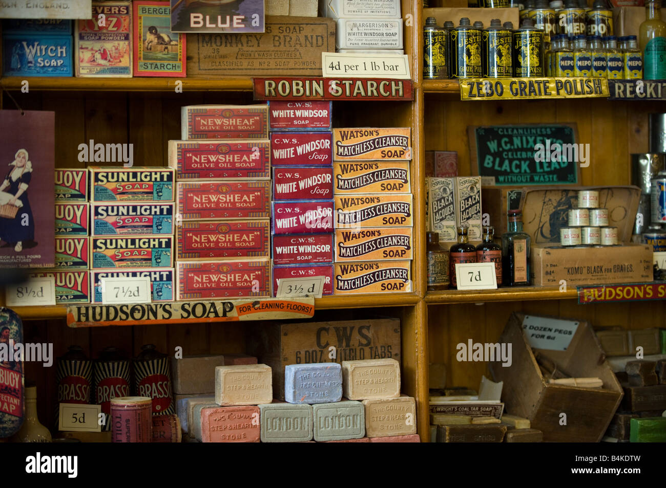 The Shelves of an old fashioned shop displaying soaps and cleaning ...