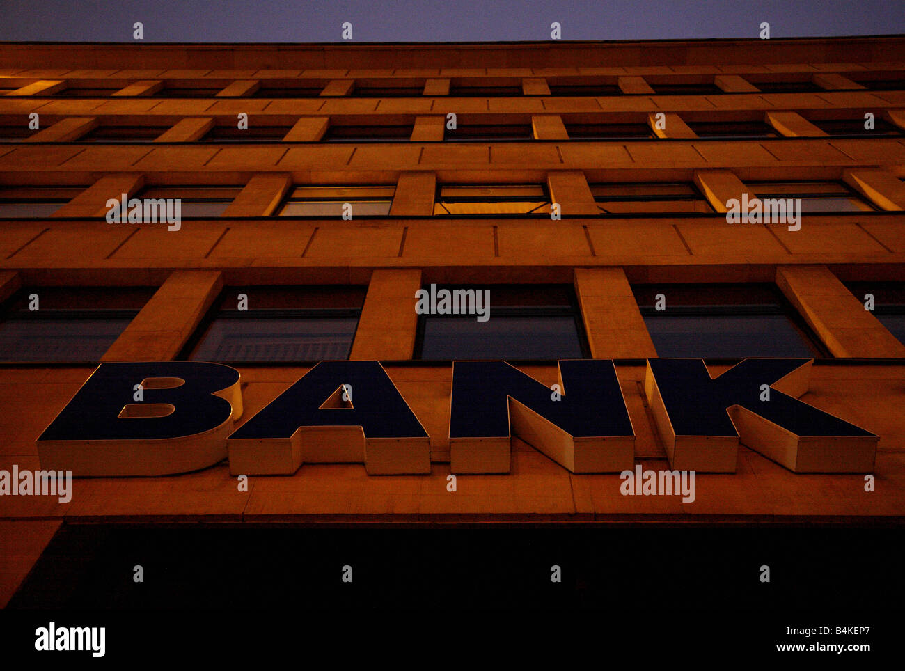 A turned off neon sign BANK on a building Stock Photo - Alamy