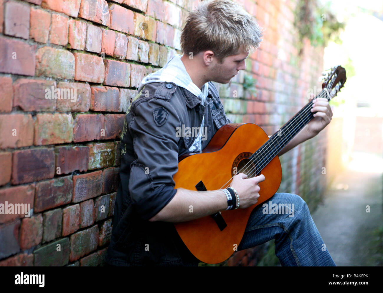 Boy busking hi-res stock photography and images - Alamy