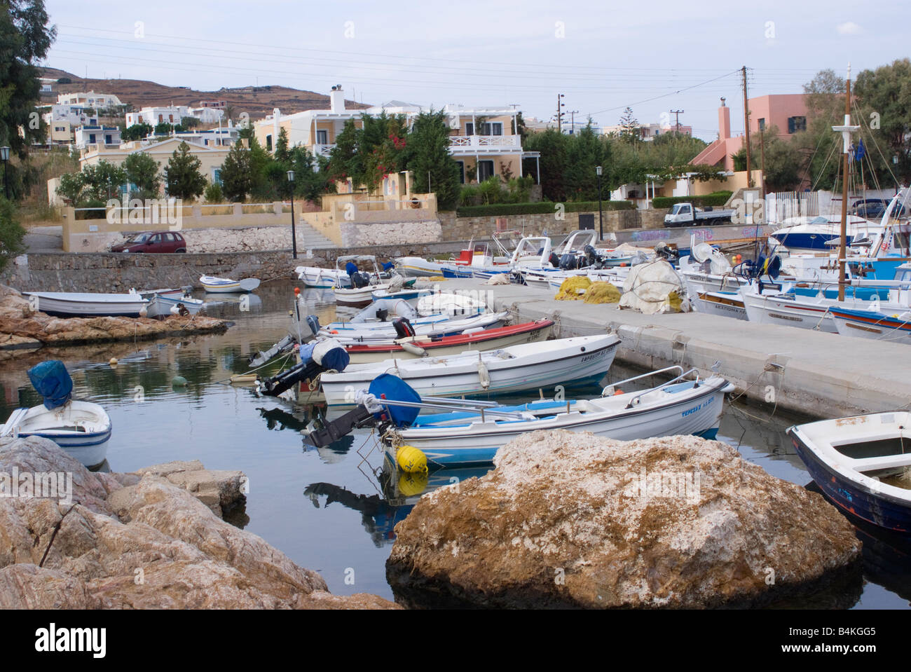 Small Greek Fishing Boats Moored in Foinix Harbour on the Isle of Siros ...