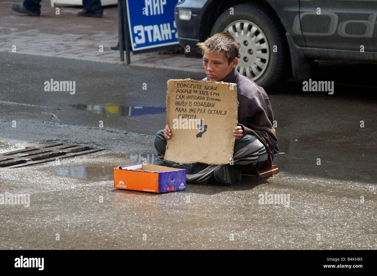 Boy begging in Irkutsk Russia Stock Photo - Alamy