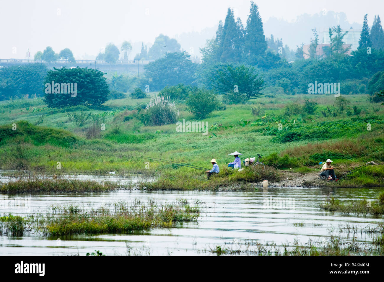 Chinese people fishing in a river, Leshan, China Stock Photo - Alamy