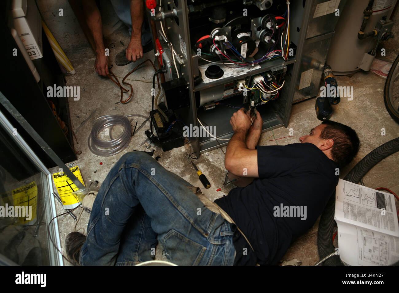 Installation of new high-efficiency gas furnace Stock Photo - Alamy