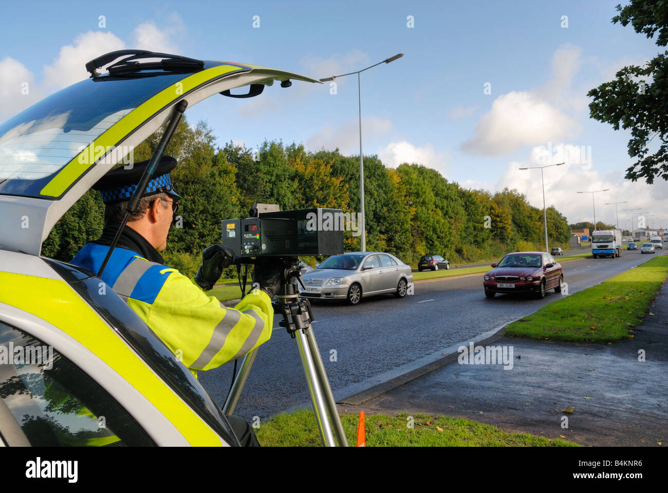 Policeman operating speed radar hi-res stock photography and images - Alamy