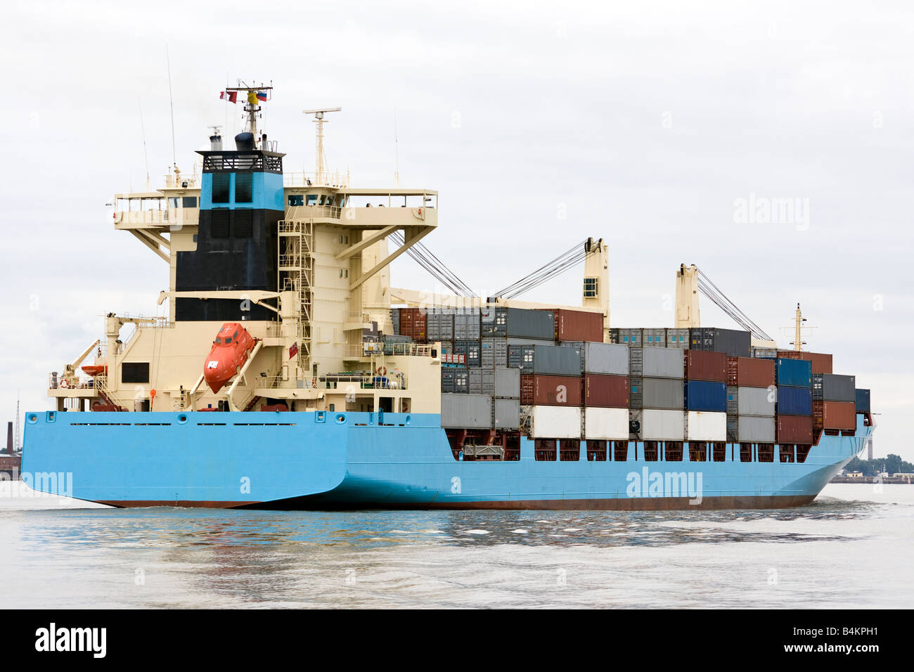 container ship sailing into port Stock Photo - Alamy