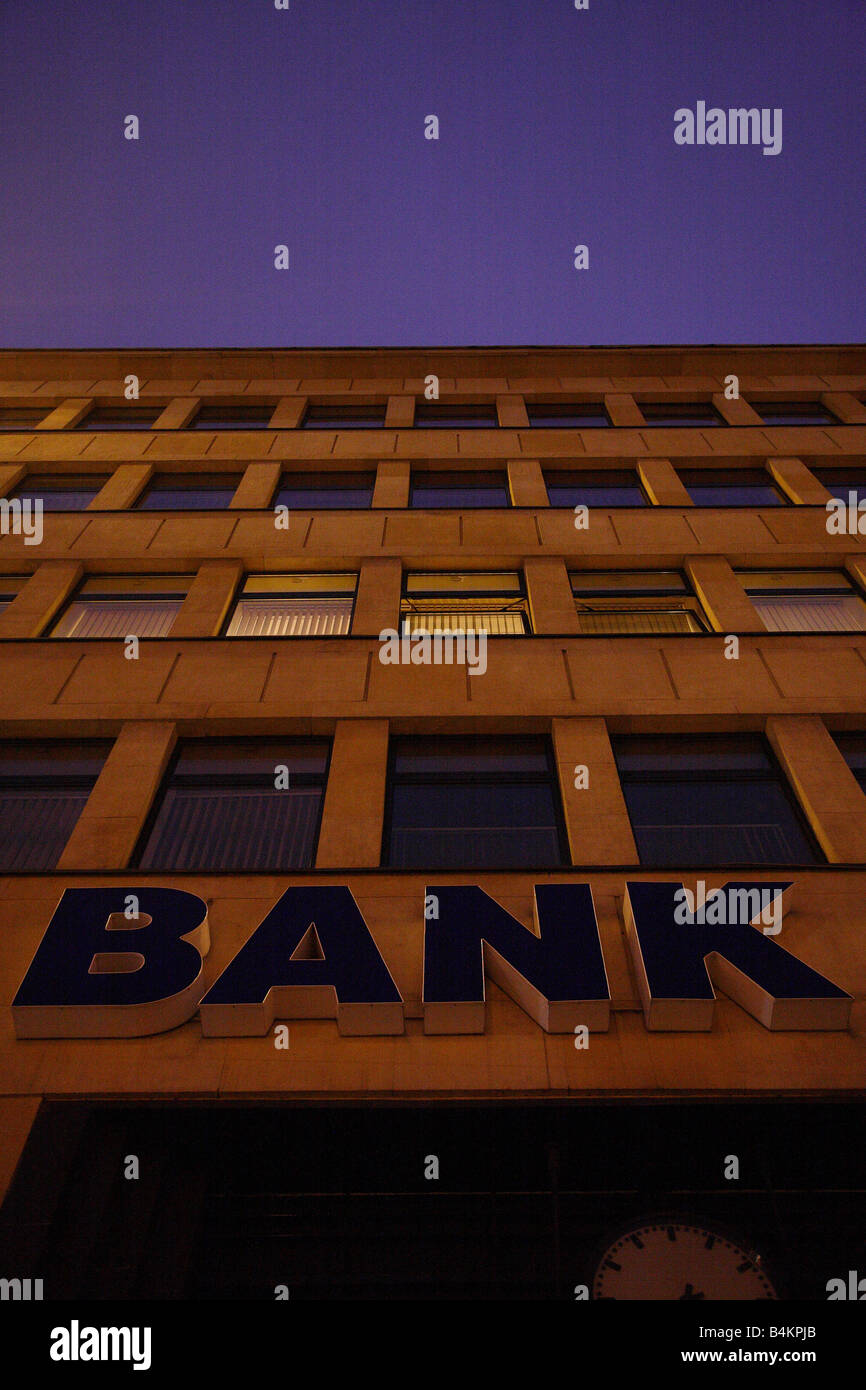 A turned off neon sign BANK on a building Stock Photo - Alamy