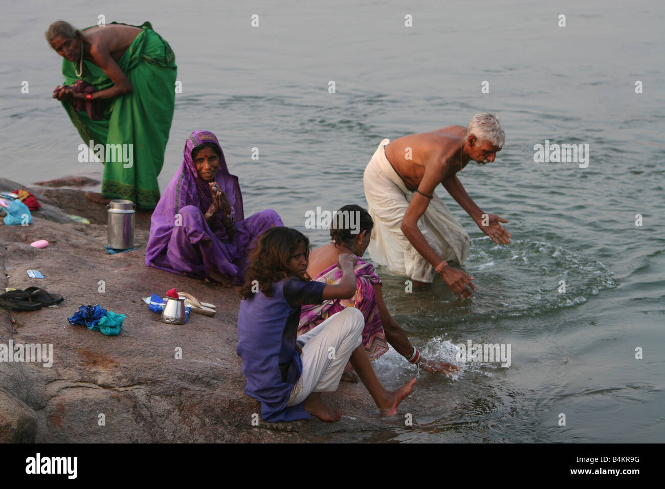 India Pilgrims cleansing themselves in the Ganges River Stock Photo - Alamy