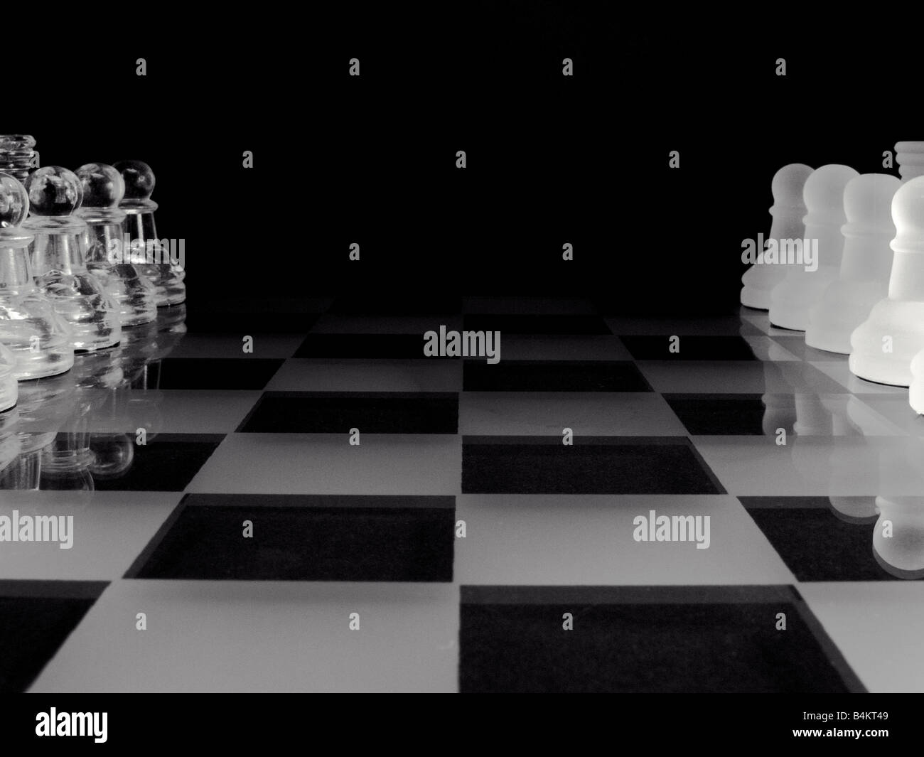 Glass Chess Set on Black Background Stock Photo - Alamy