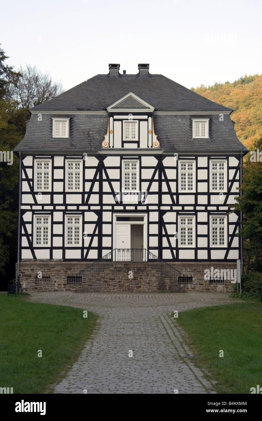 halftimbered mansion with slated roof with an old lane in the ...