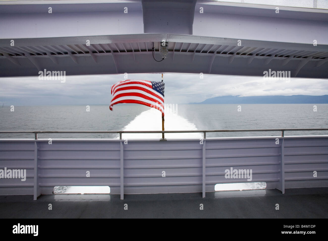 Flag flying on an Alaska Ferry Stock Photo - Alamy