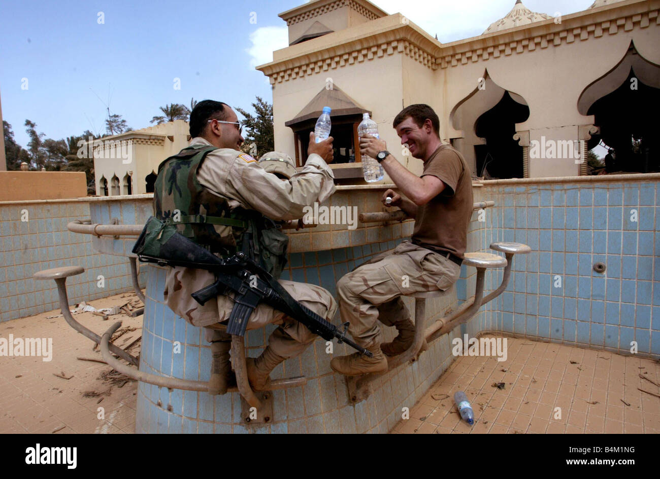 Iraq War 2003 US infantrymen try out the pool bar at Saddam s son Uday ...