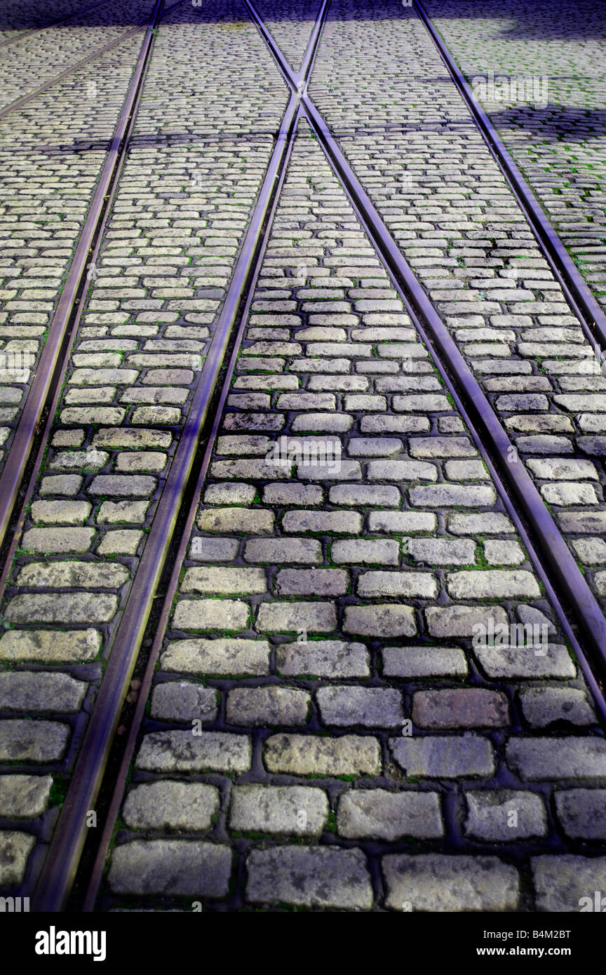 Old Vintage Tram lines in a victorian cobbled street in the sunshine ...