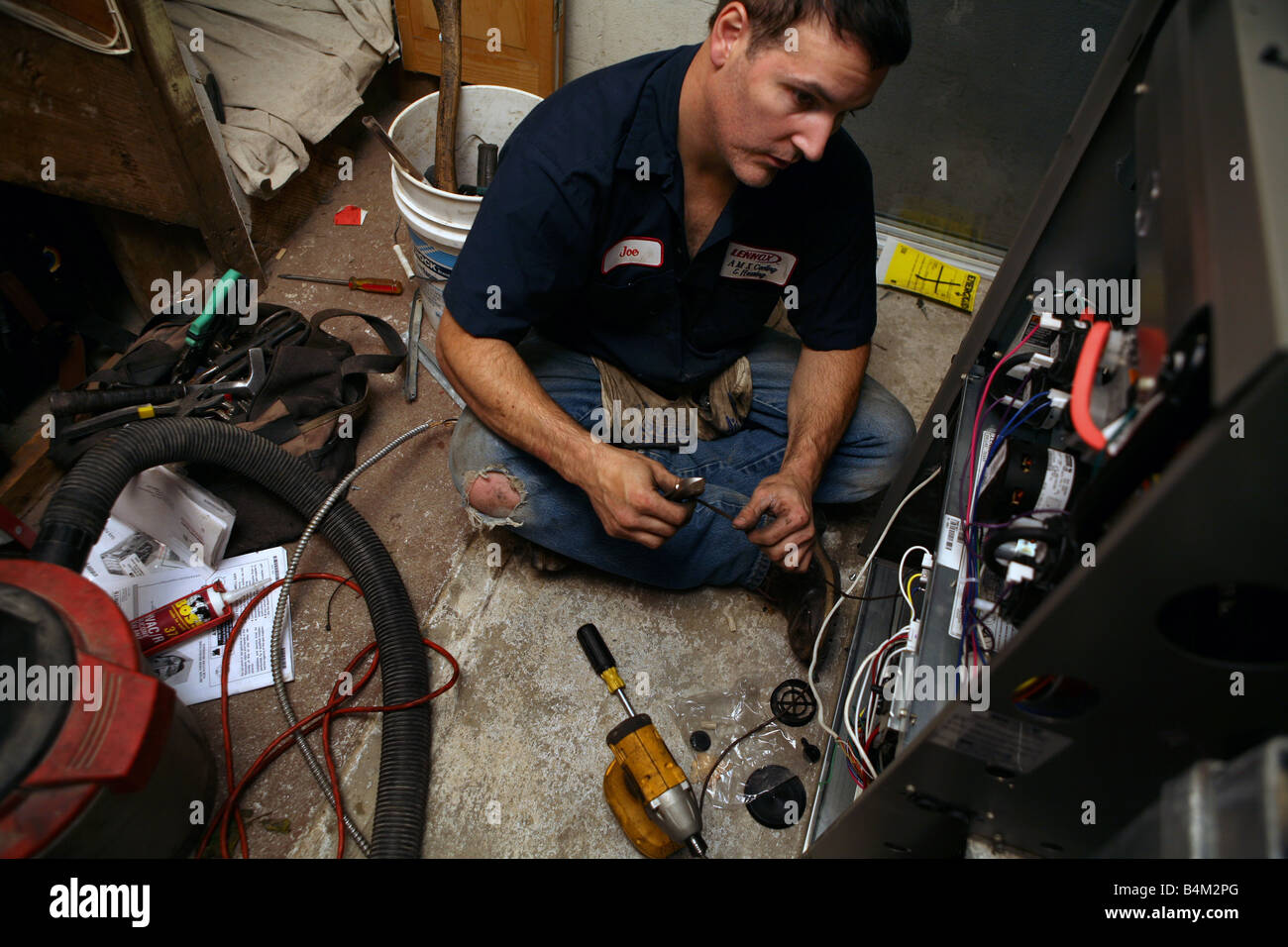 Installation of new high-efficiency gas furnace Stock Photo - Alamy
