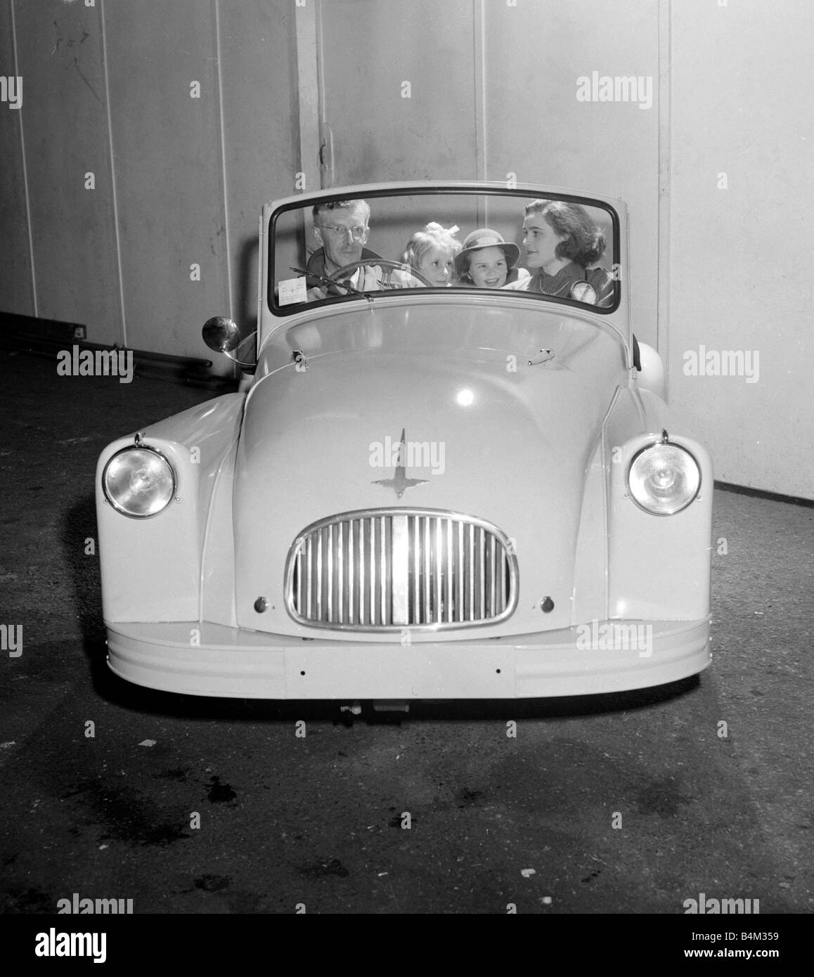 Bond Minicar A three wheeled small open top car The driver of this car ...