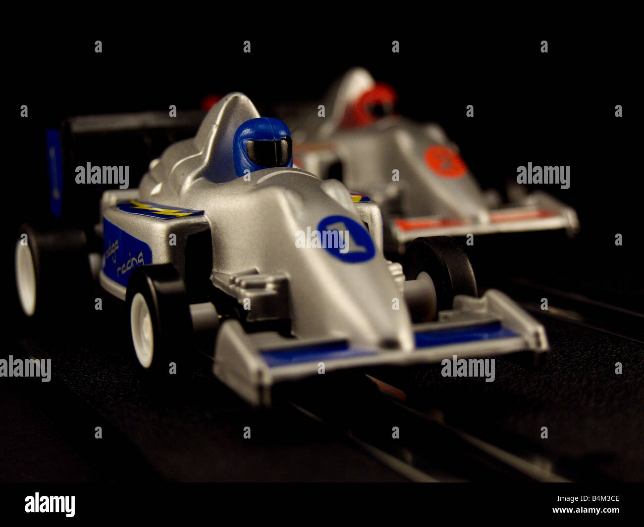 Toy Racing Cars on Black Background Stock Photo - Alamy