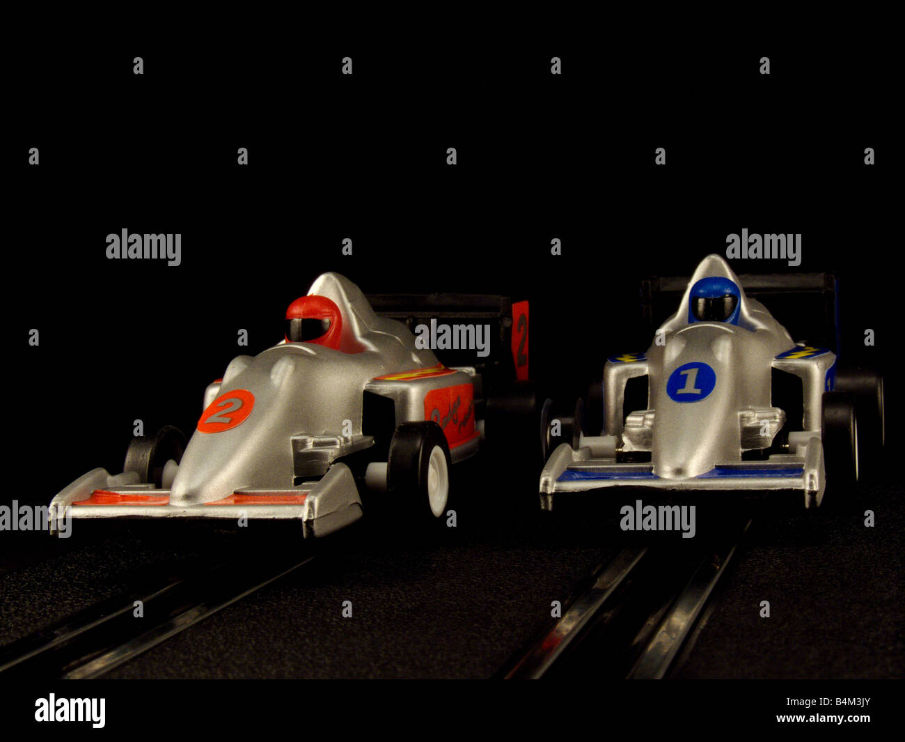 Toy Racing Cars on Black Background Stock Photo - Alamy