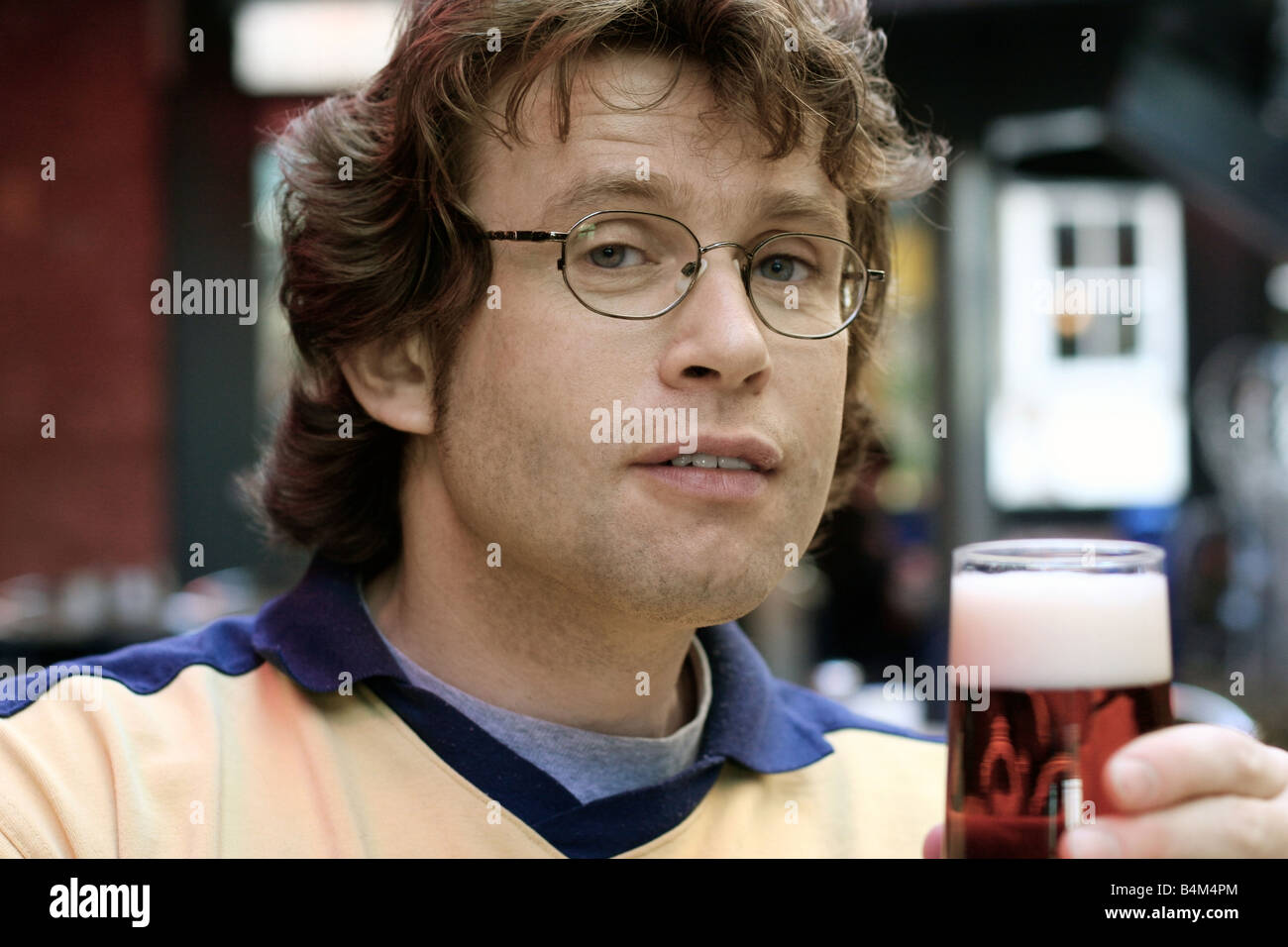 Pub drinking ale young men hi-res stock photography and images - Alamy