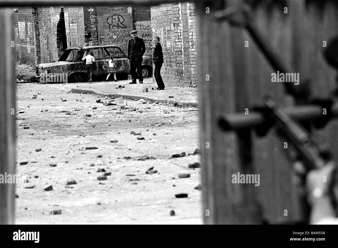A burnt out car in Edlingham Street New Lodge Road Belfast after all ...