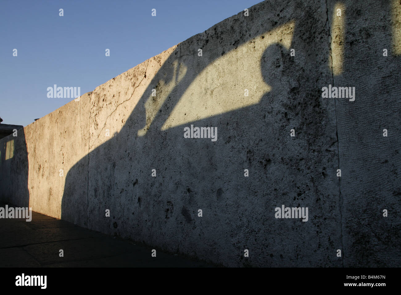 one car shadow on wall in city with blue sky Stock Photo - Alamy