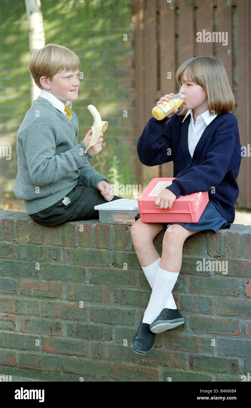 Kids eating their lunch at school August 1993 Stock Photo - Alamy