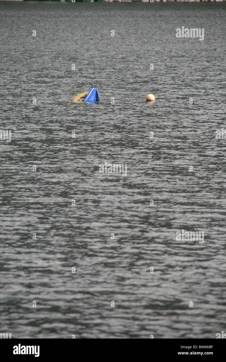 one sinking boat on tourist boating lake Stock Photo - Alamy