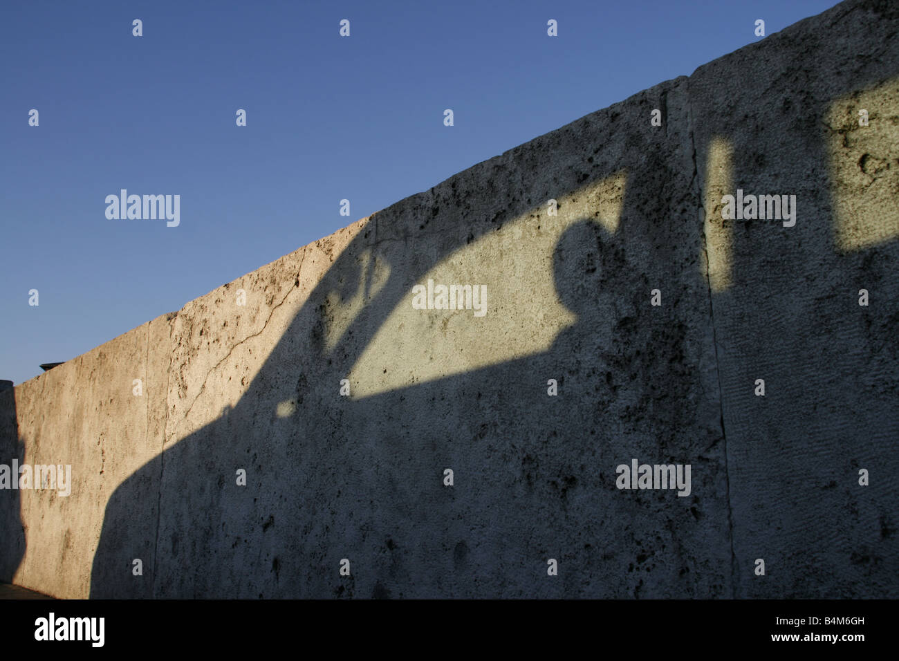 one car shadow on wall in city with blue sky Stock Photo - Alamy