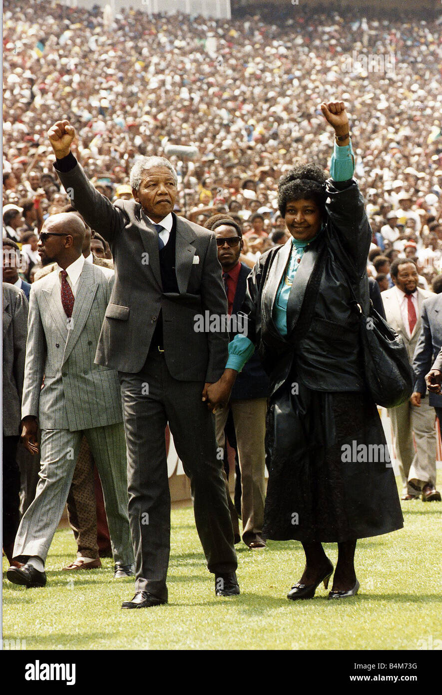 Nelson Mandela leader of ANC released from prison 1990 salute the crowd with his wife Winnie ...